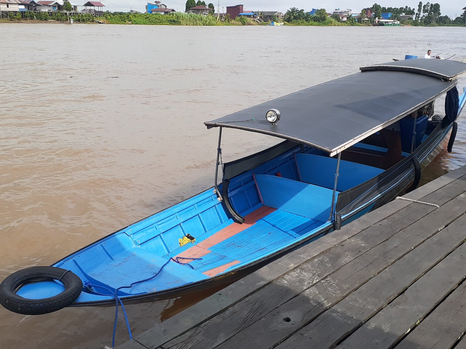 Watching Dolphins in the Mahakam River and Visiting Stilted Villages ...