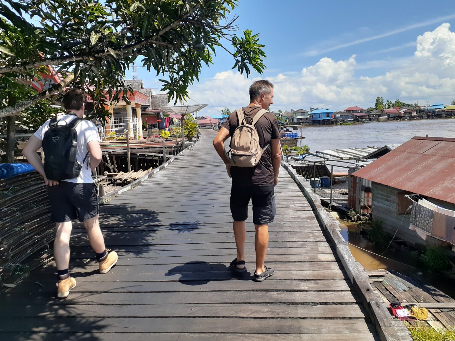 Watching Dolphins in the Mahakam River and Visiting Stilted Villages ...